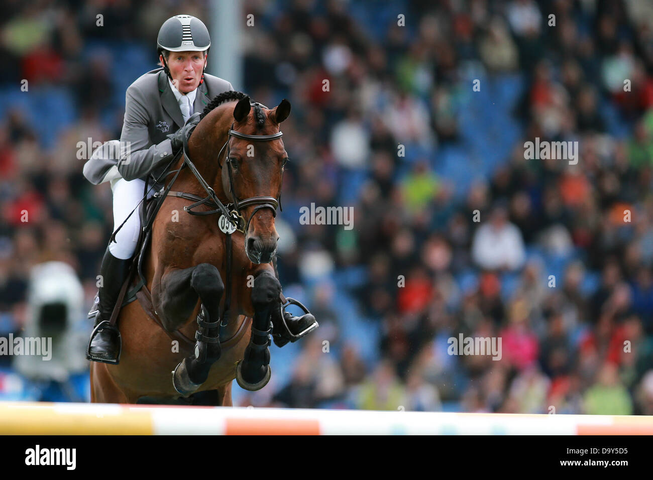German show jumper Ludger Beerbaum jumps on her his Chaman during the ...