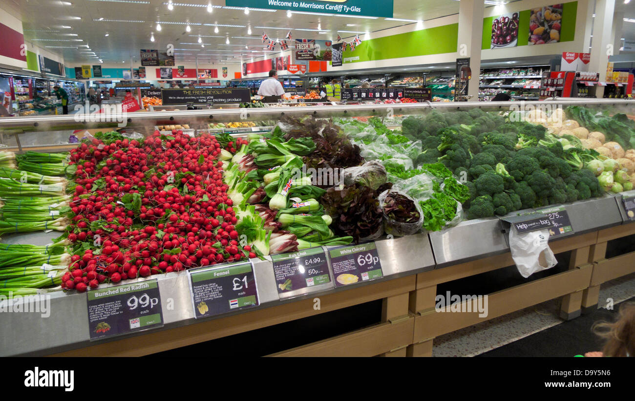 Lettuce, broccoli, spring onions display fresh veg vegetables and mist ...