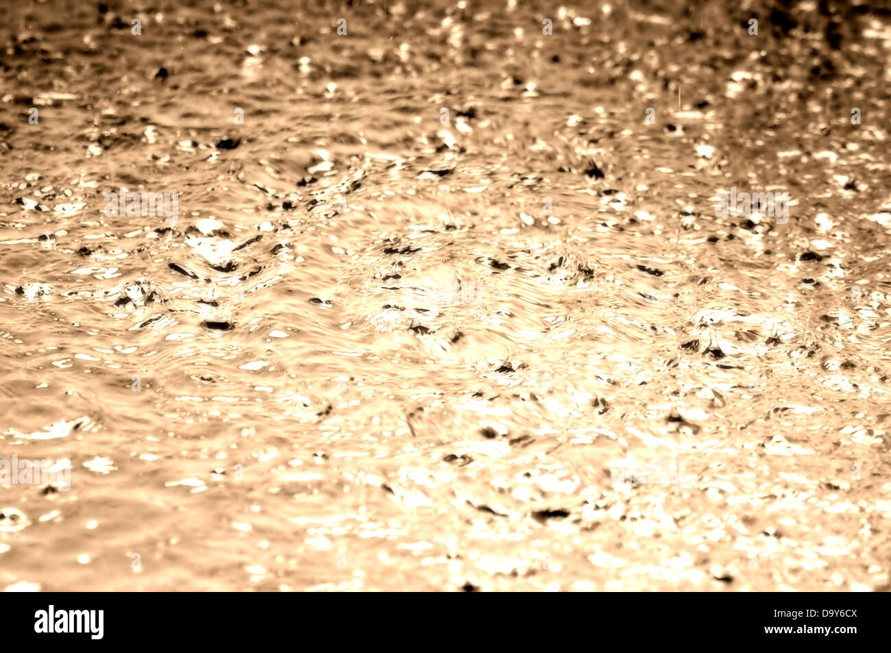 Abstract of rain falling on water Stock Photo - Alamy
