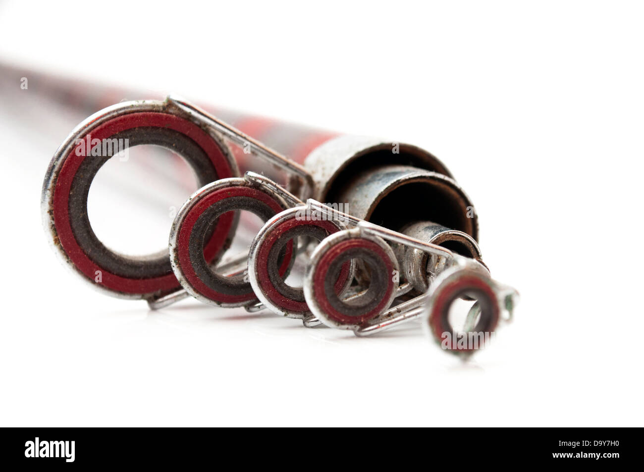 fishing rod on a white background Stock Photo - Alamy