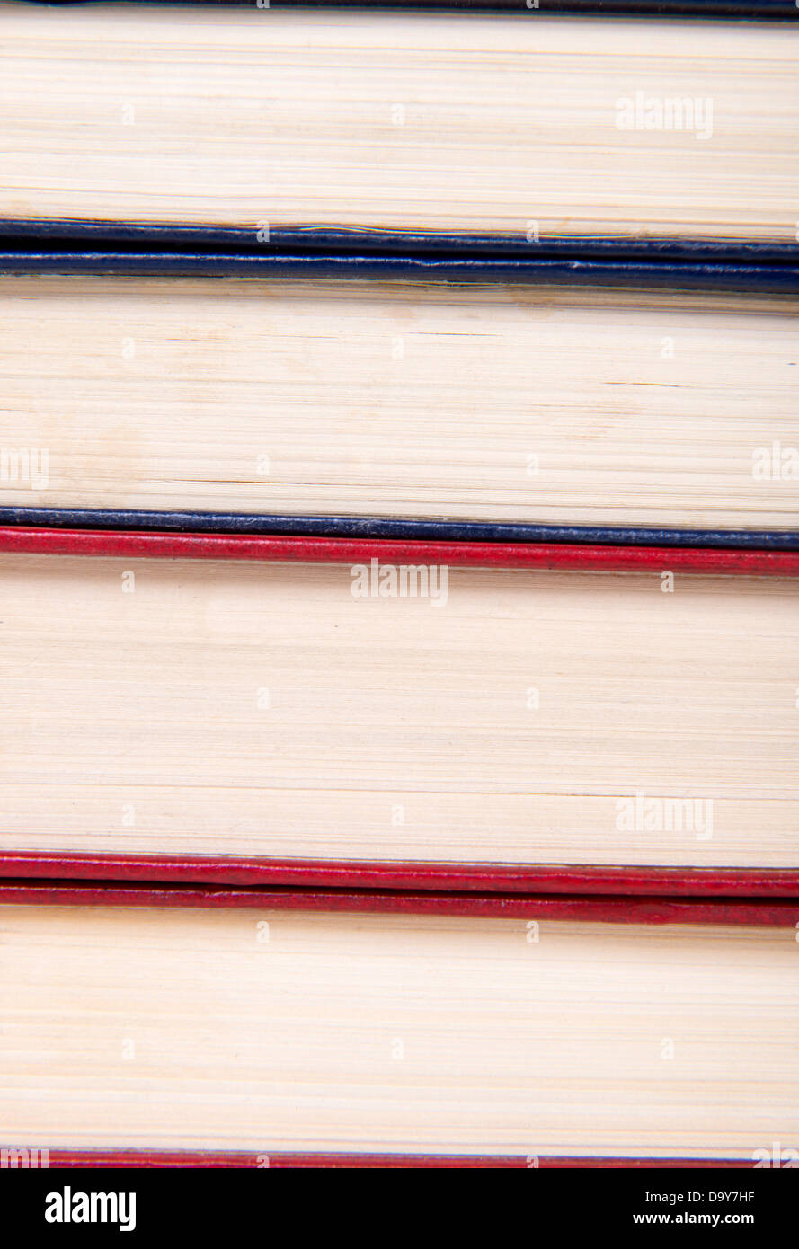 Multicolored books stack isolated on white background Stock Photo - Alamy