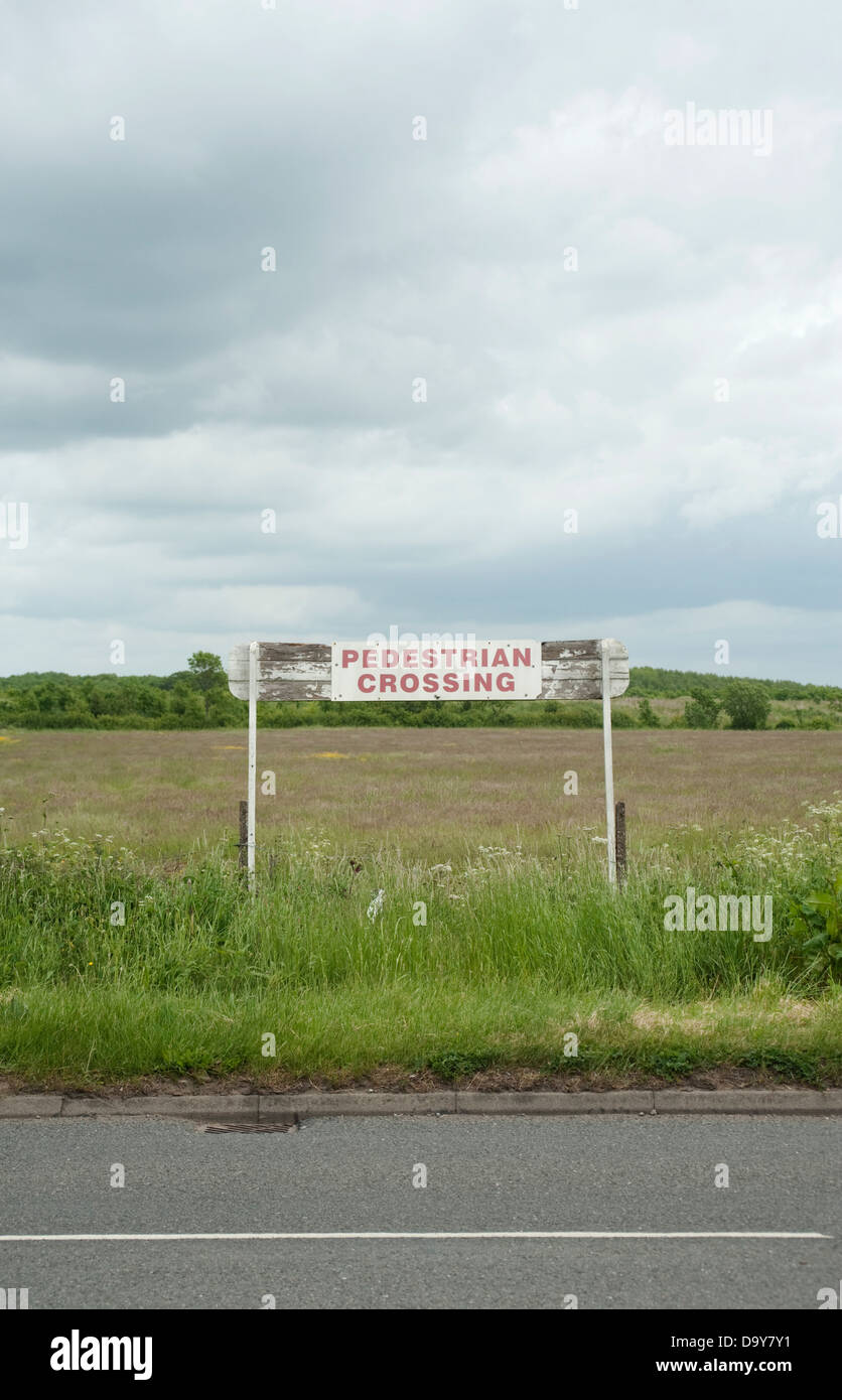 A Pedestrian Crossing sign across the road from the Heritage Motor ...