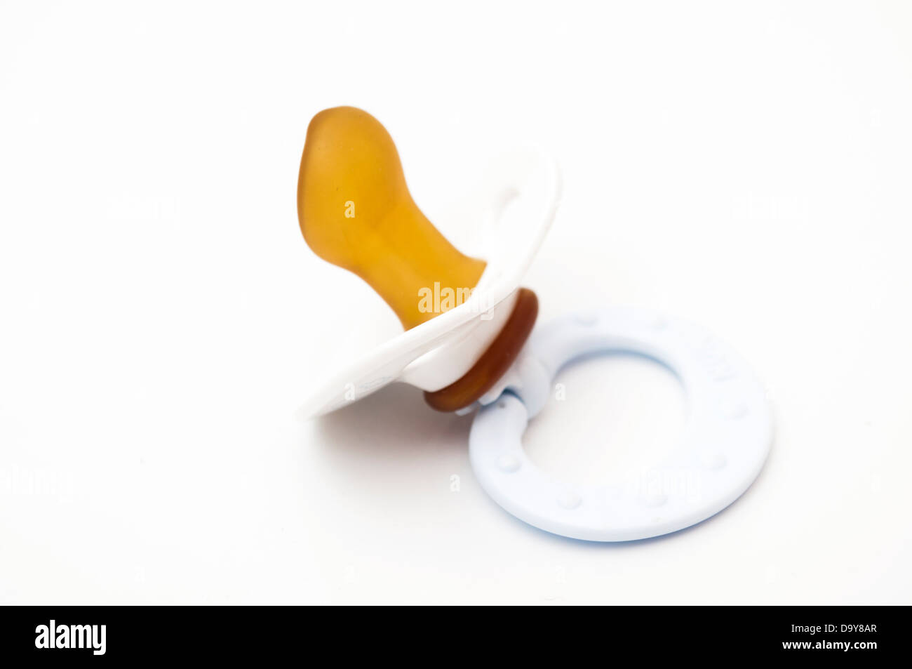 pacifier on a white background Stock Photo - Alamy