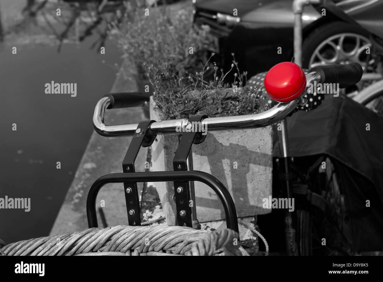 black and white image of a red bicycle bell on a vintage bicycle in ...