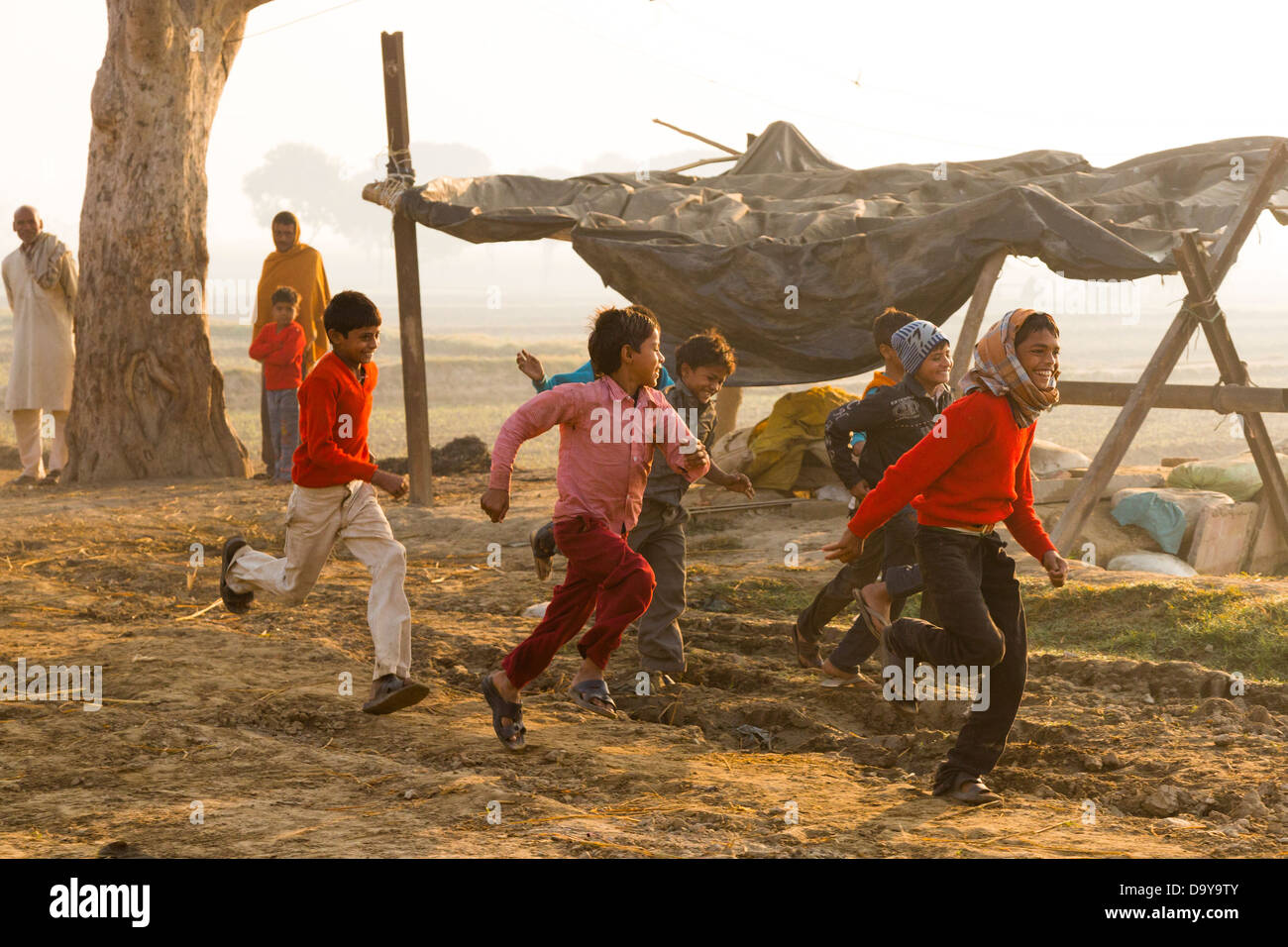 India, Uttar Pradesh, Aligarh boys running Stock Photo - Alamy