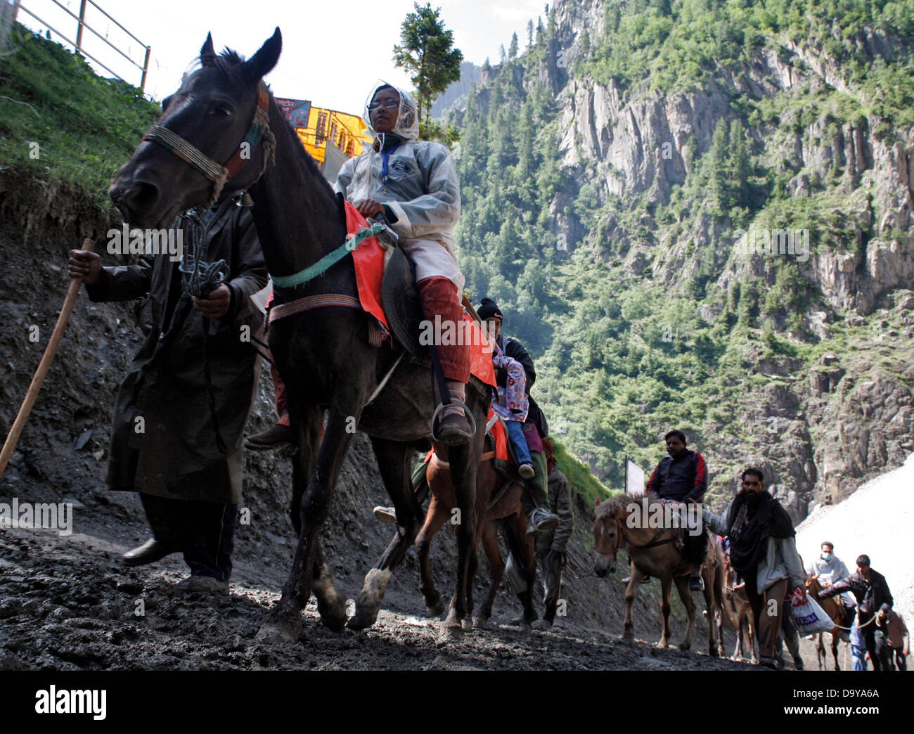 Baltal, Indian Administered Kashmir 28th June 2013.Hindu devotees walk ...