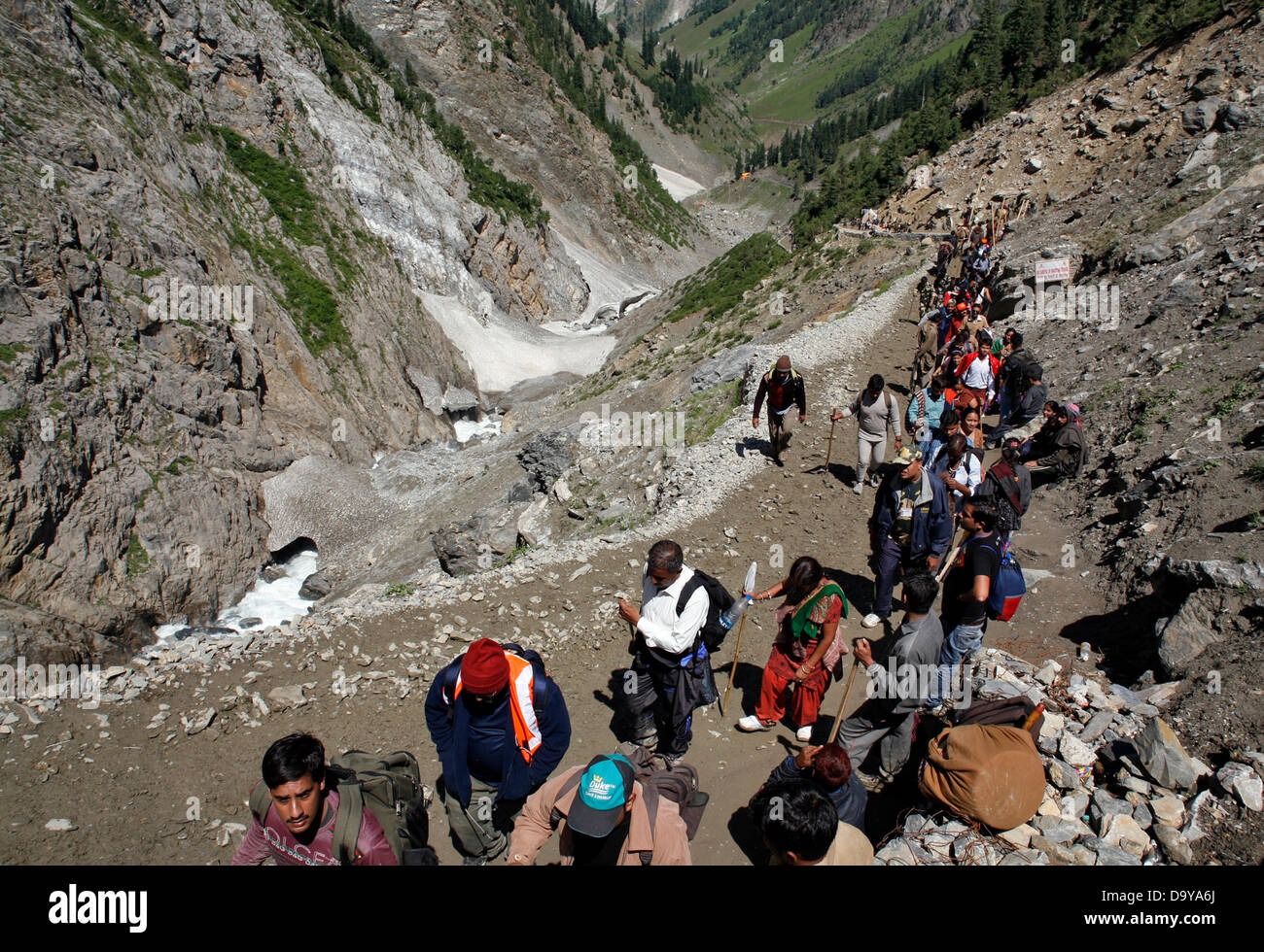 Baltal, Indian Administered Kashmir 28th June 2013.Hindu devotees walk ...