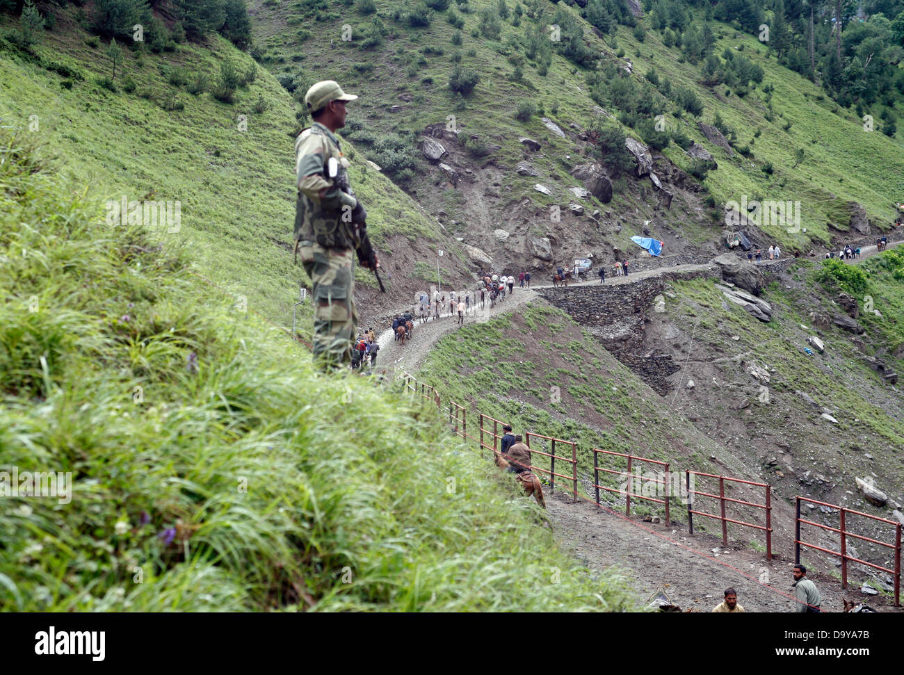 Baltal, Indian Administered Kashmir 28th June 2013. An Indian policeman ...