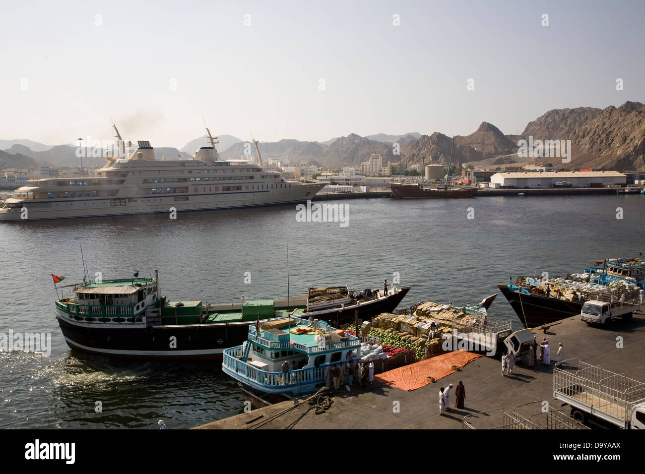 Traditional-style dhows are still used to transport cargo from Muscat ...
