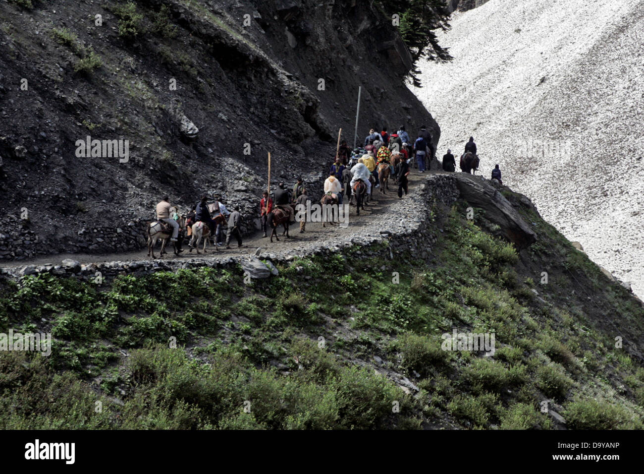 Baltal, Indian Administered Kashmir 28th June 2013.Hindu devotees walk ...