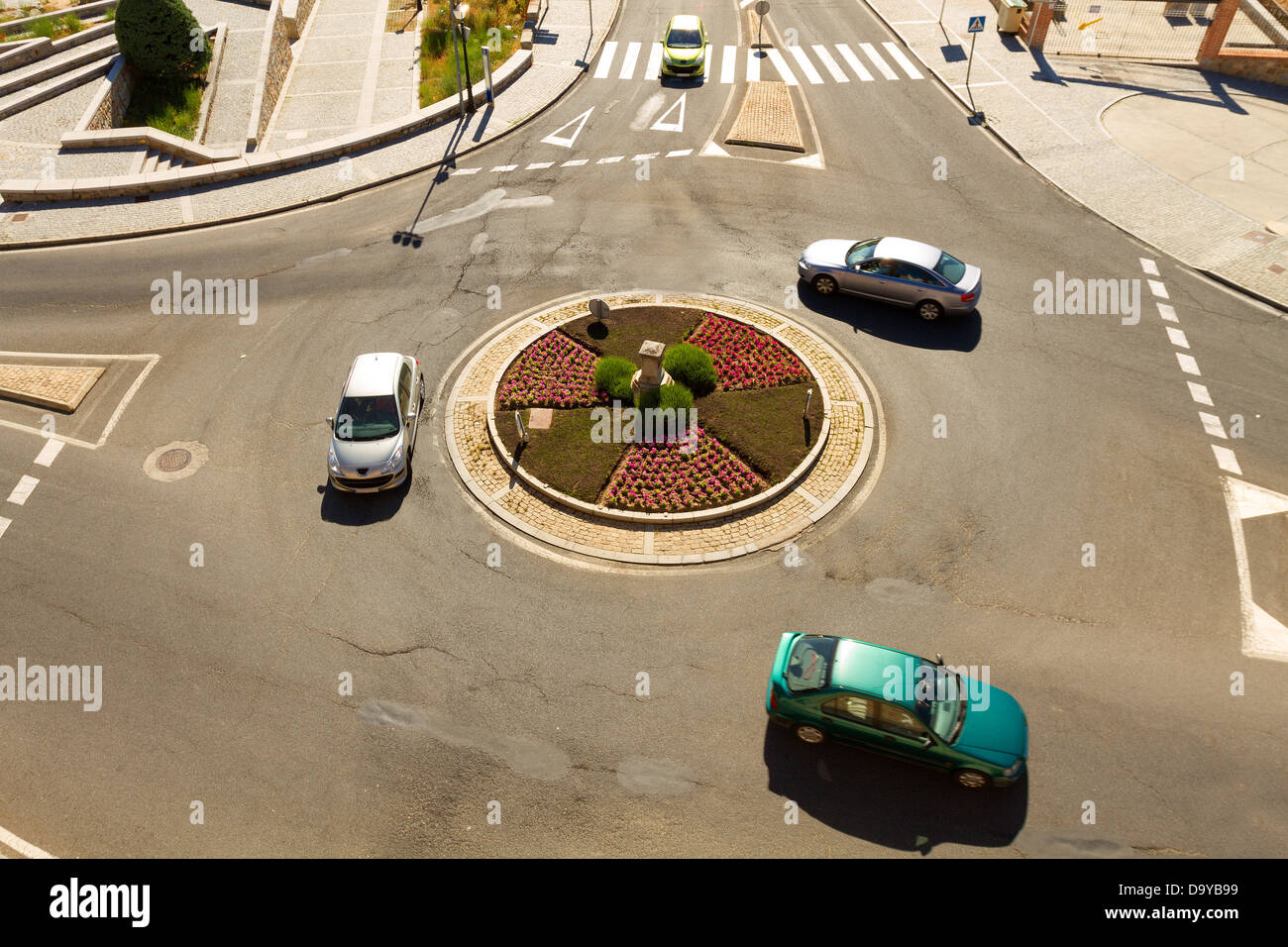 Cars in a roundabout in a high view Stock Photo - Alamy
