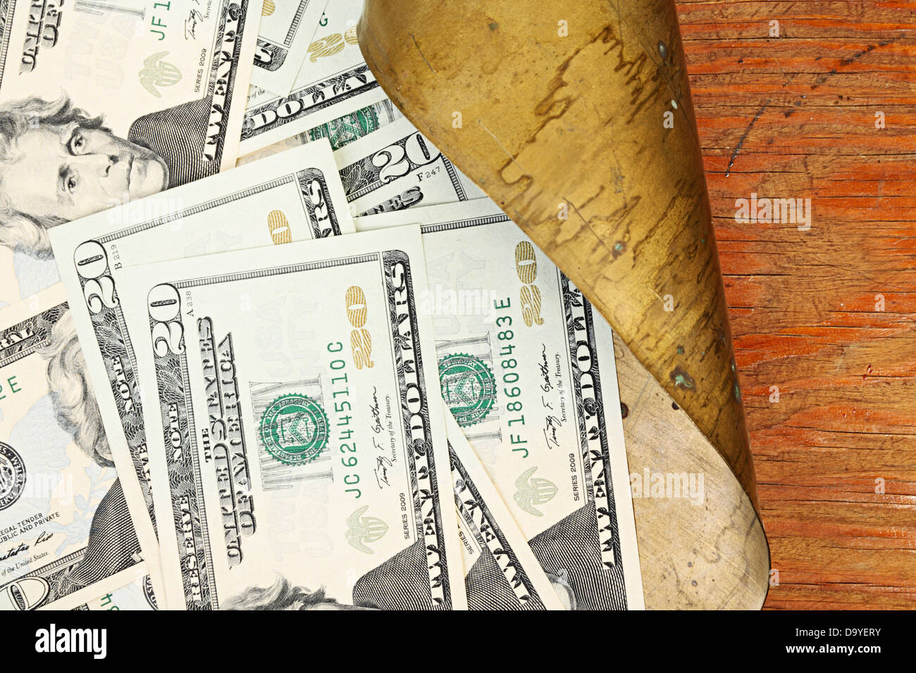Abstract money background. Dollars, metal, wood Stock Photo - Alamy