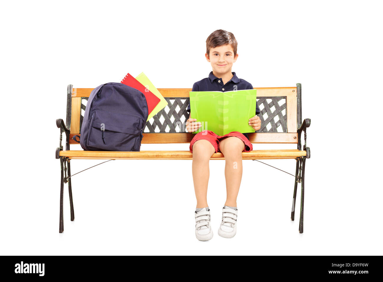 Reading a book on chair Cut Out Stock Images & Pictures - Alamy