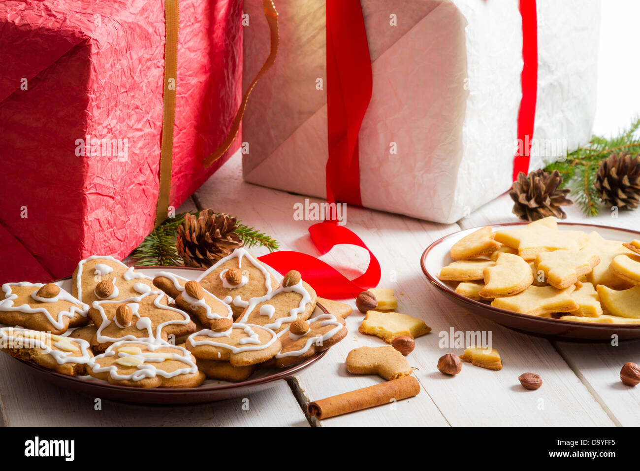 Christmas view on the table full of gifts and cookies Stock Photo - Alamy