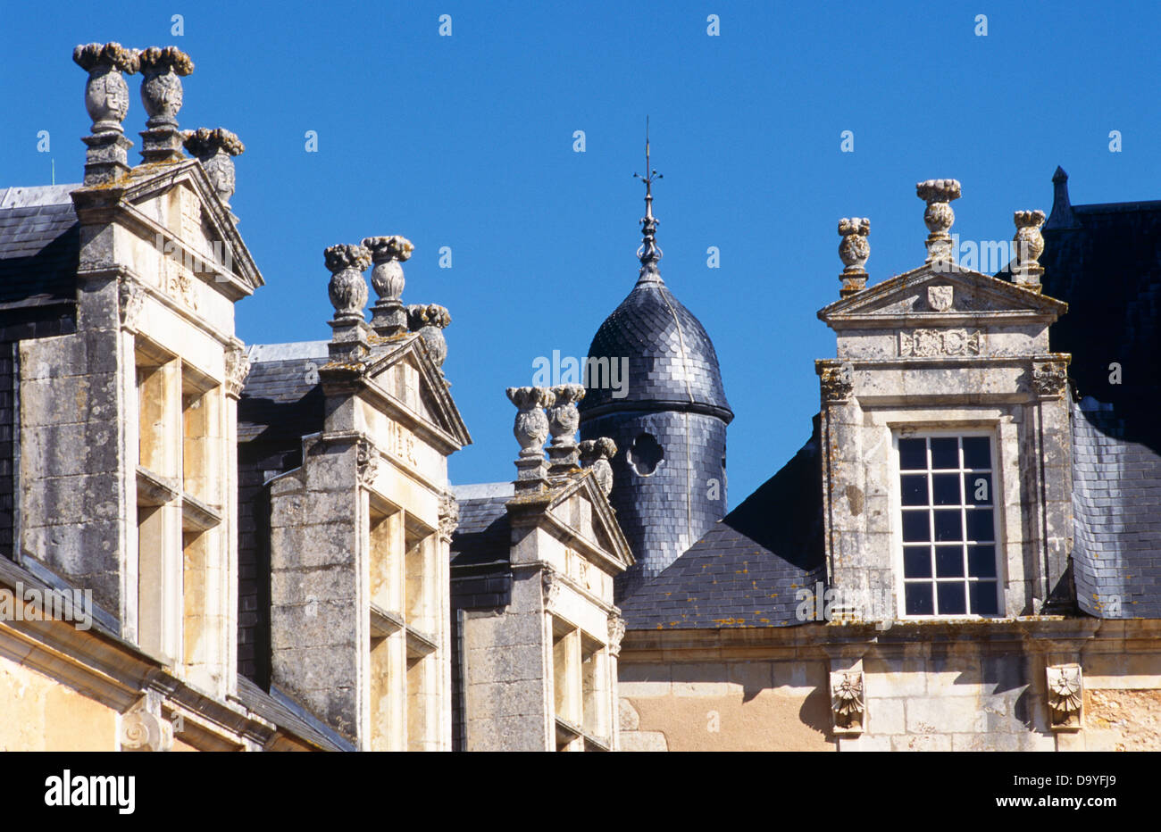 Close-up of turrets and classical pediments above windows of French ...