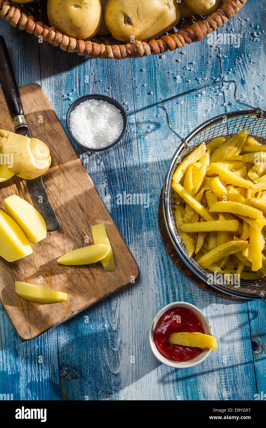 During the preparation of homemade fries Stock Photo - Alamy