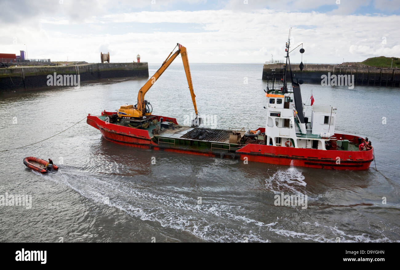 Dredging vessel working in Heysham Harbour, Morecambe Bay, Heysham ...