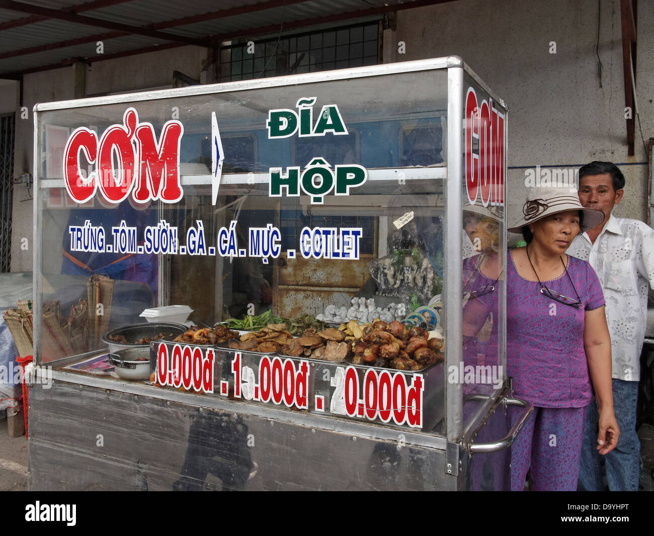 A snack stall at Hue railway station, Vietnam Stock Photo - Alamy