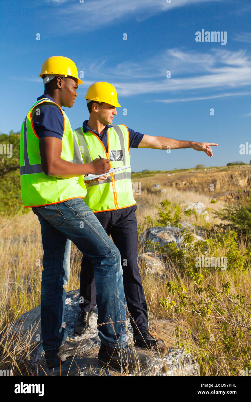 two male surveyors at work Stock Photo - Alamy