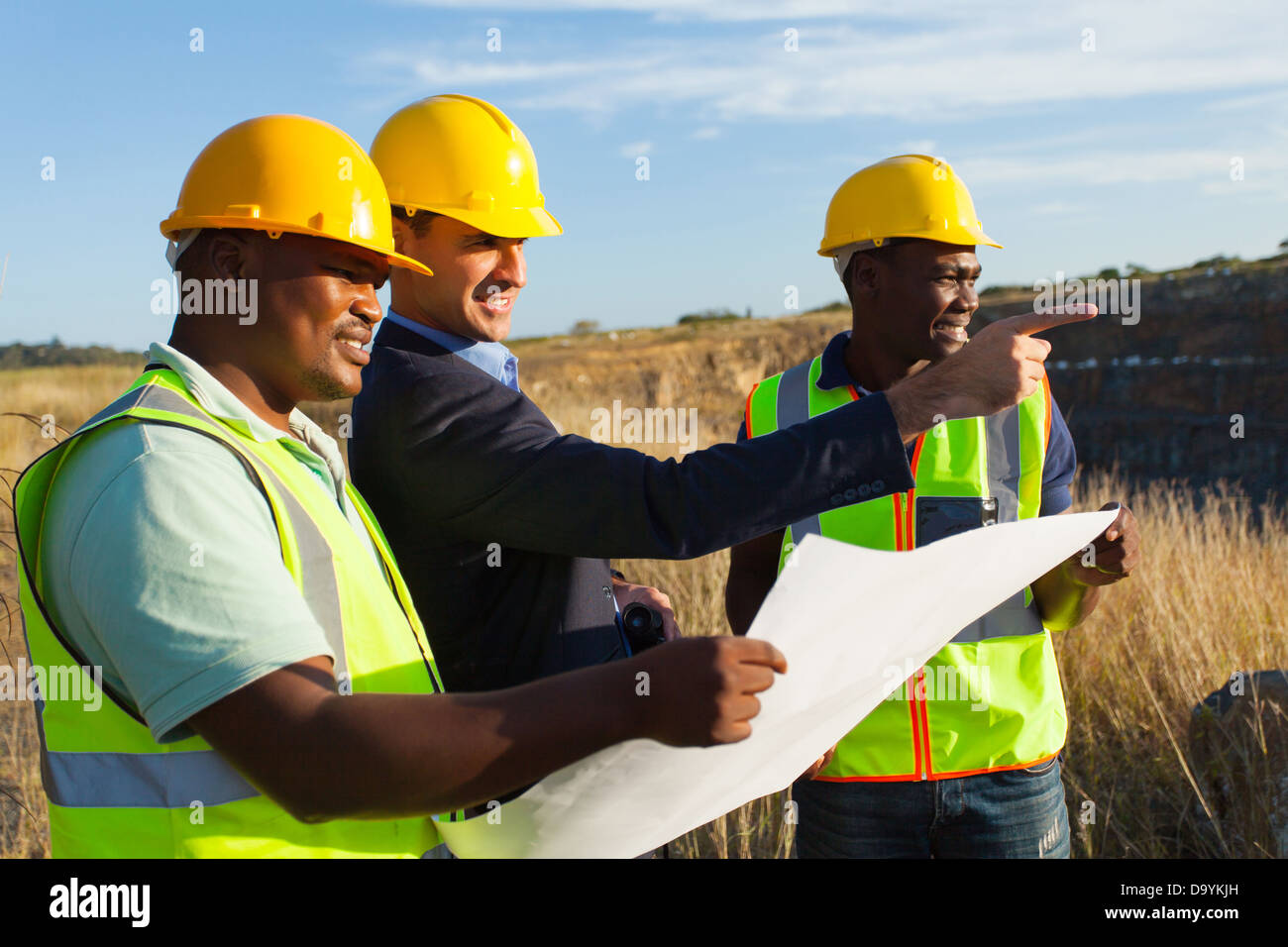 mine manager and workers at quarry discussing future plan Stock Photo ...