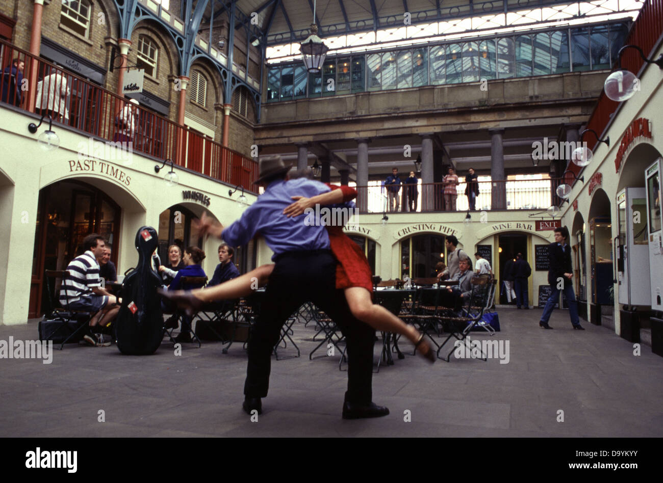 A couple dancing Tango inside Covent Garden market hall London UK Stock ...