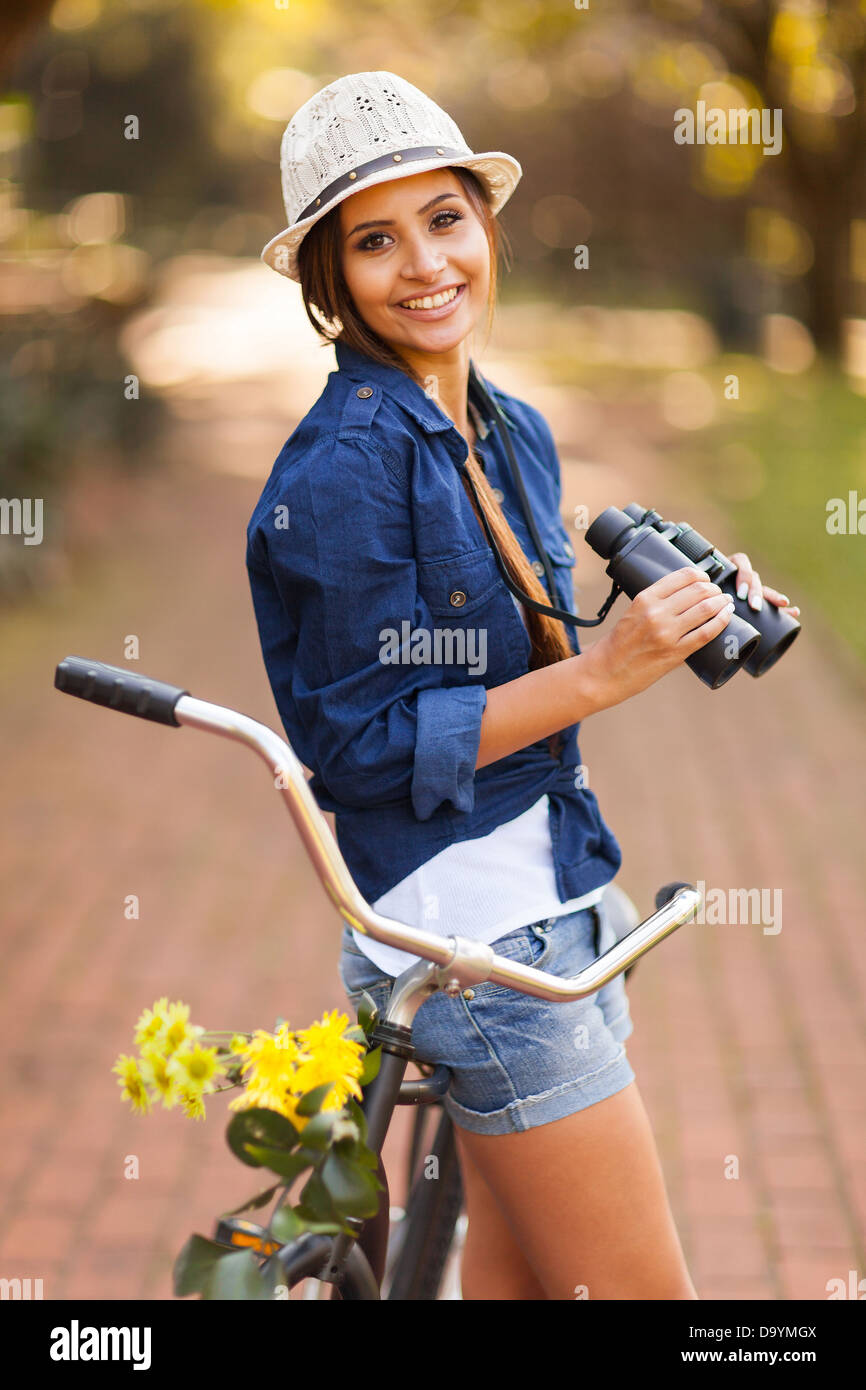 portrait of happy woman with binoculars outdoors Stock Photo - Alamy