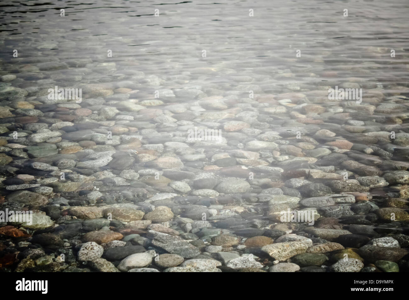 Stones in water Stock Photo - Alamy