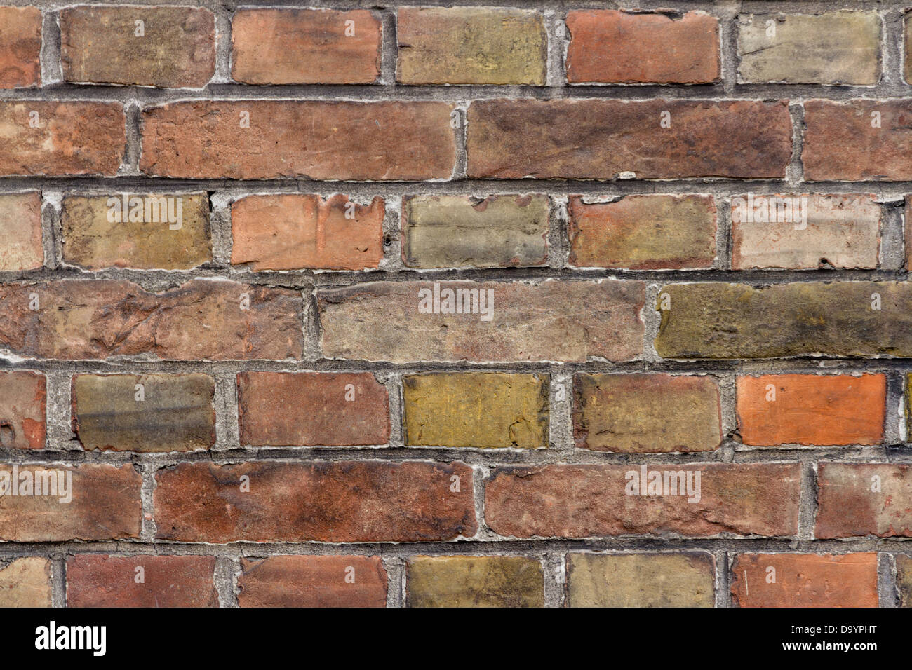 Closeup of a colorful brick wall Stock Photo - Alamy