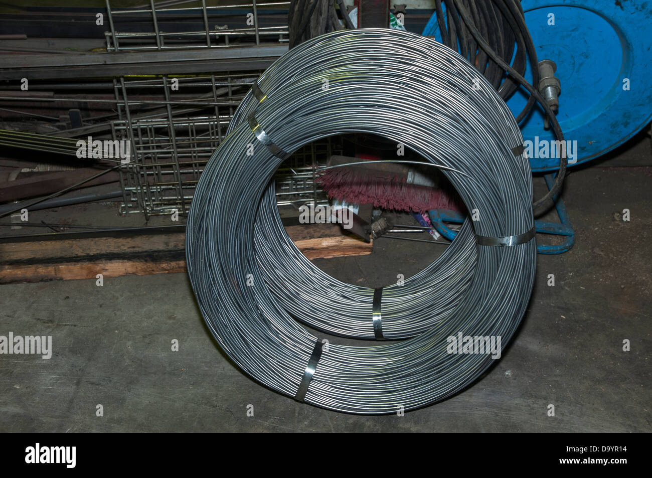iron coil placed above the pallet ready to cut Stock Photo - Alamy