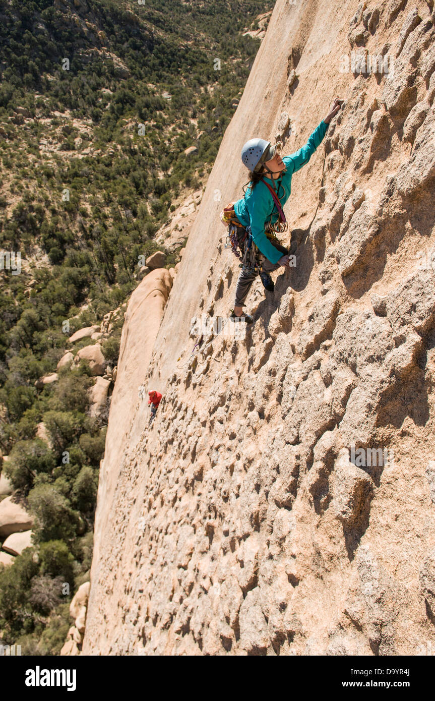 Two women rock climbing in Cochise Stronghold, Dragoon Range, Coronado ...