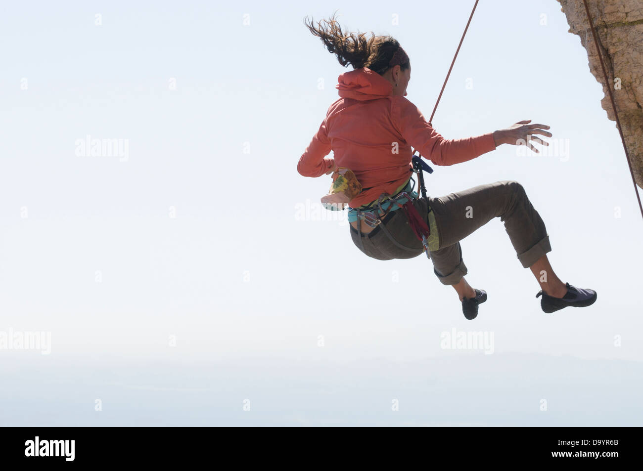 A woman falling off a rock climb at Windy Point, Mount Lemmon Highway ...