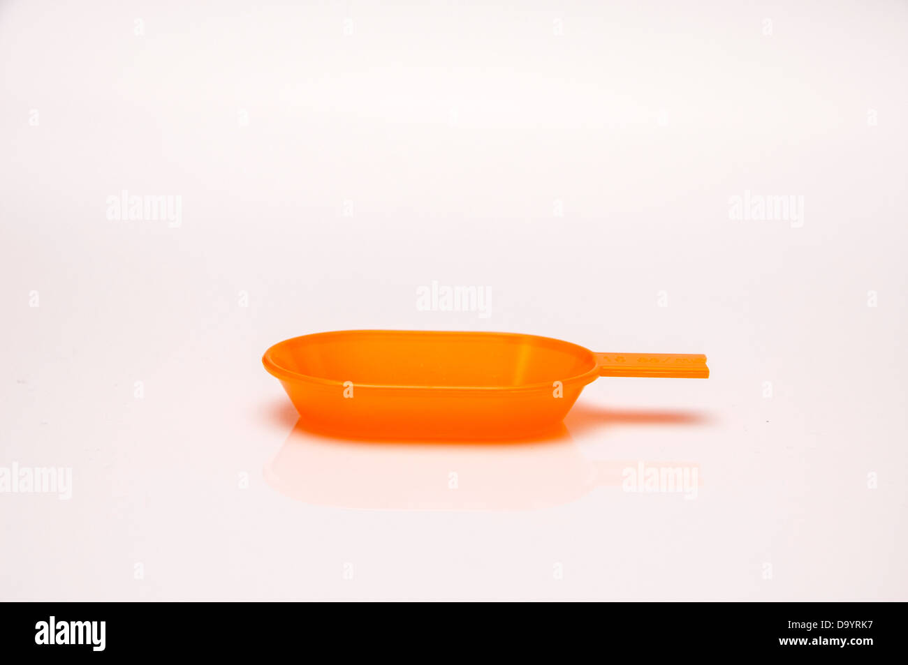 spoon yellow color to make syrup Stock Photo - Alamy