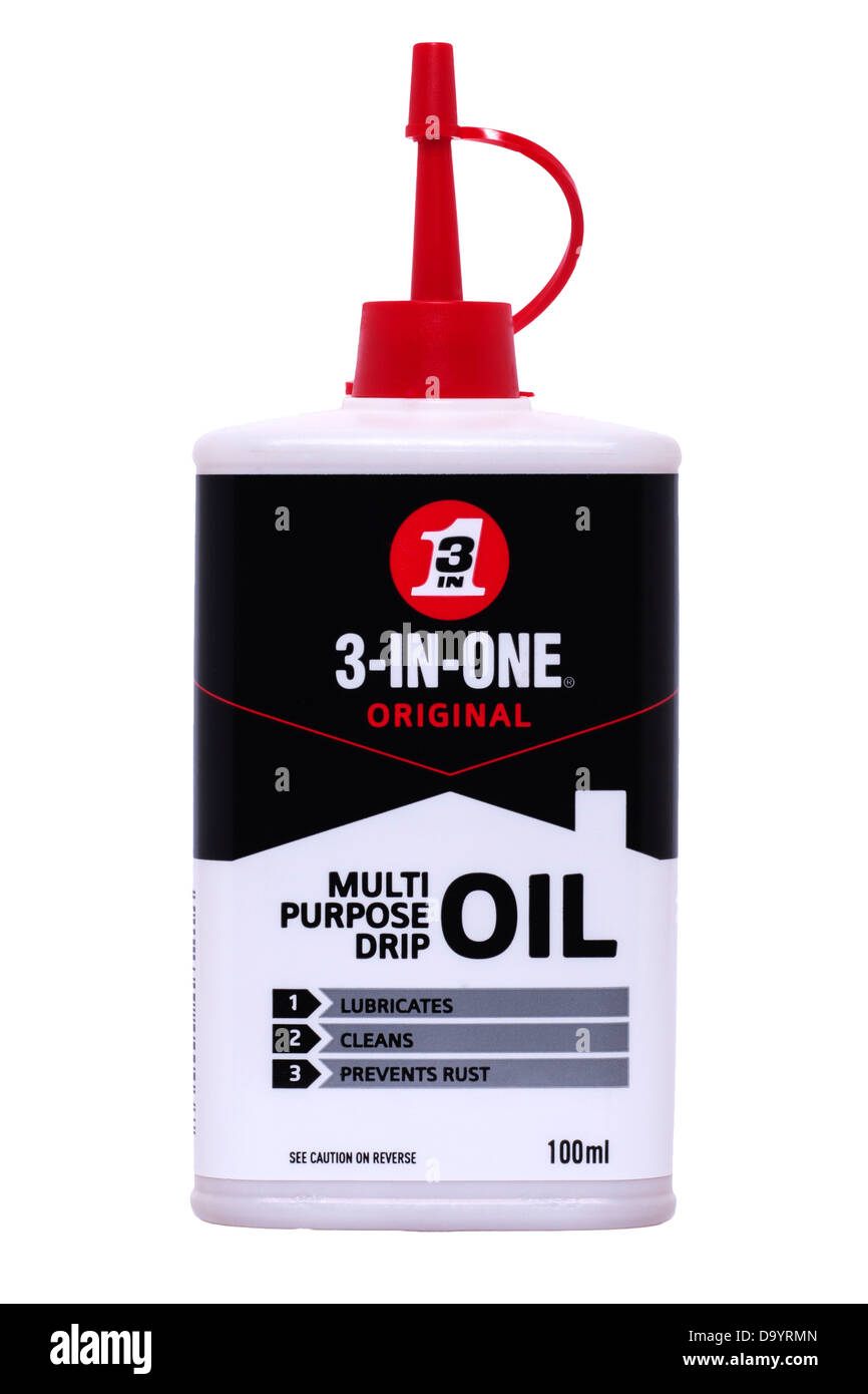 A tin of 3-in-one original multi purpose drip oil on a white background ...