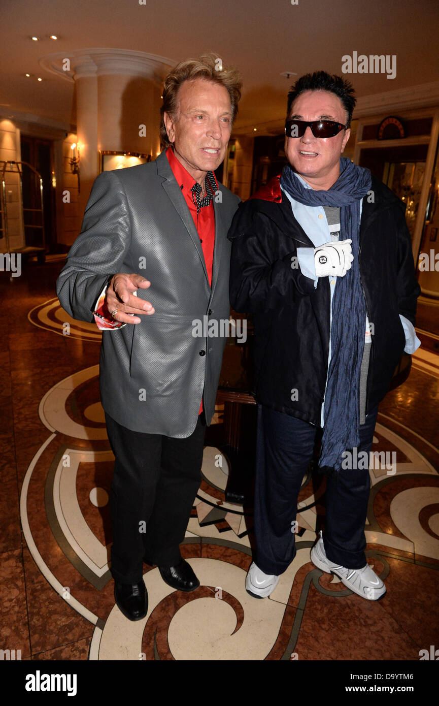 Munich, Germany. 28th June, 2013. Magicians Siegfried and Roy pose at ...