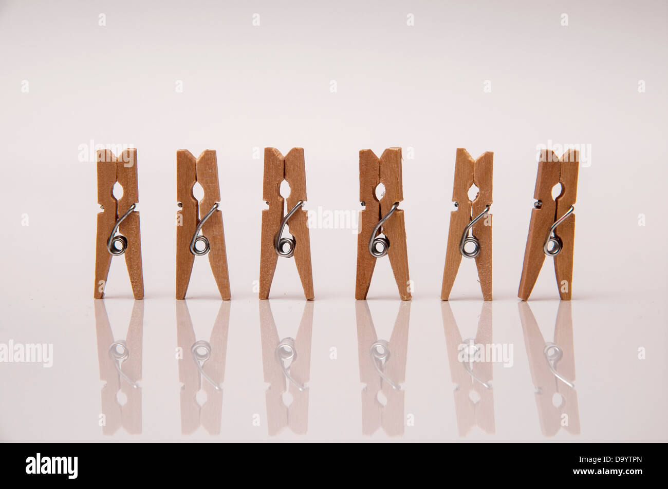 small wooden clamps to attach several sheets of paper Stock Photo - Alamy