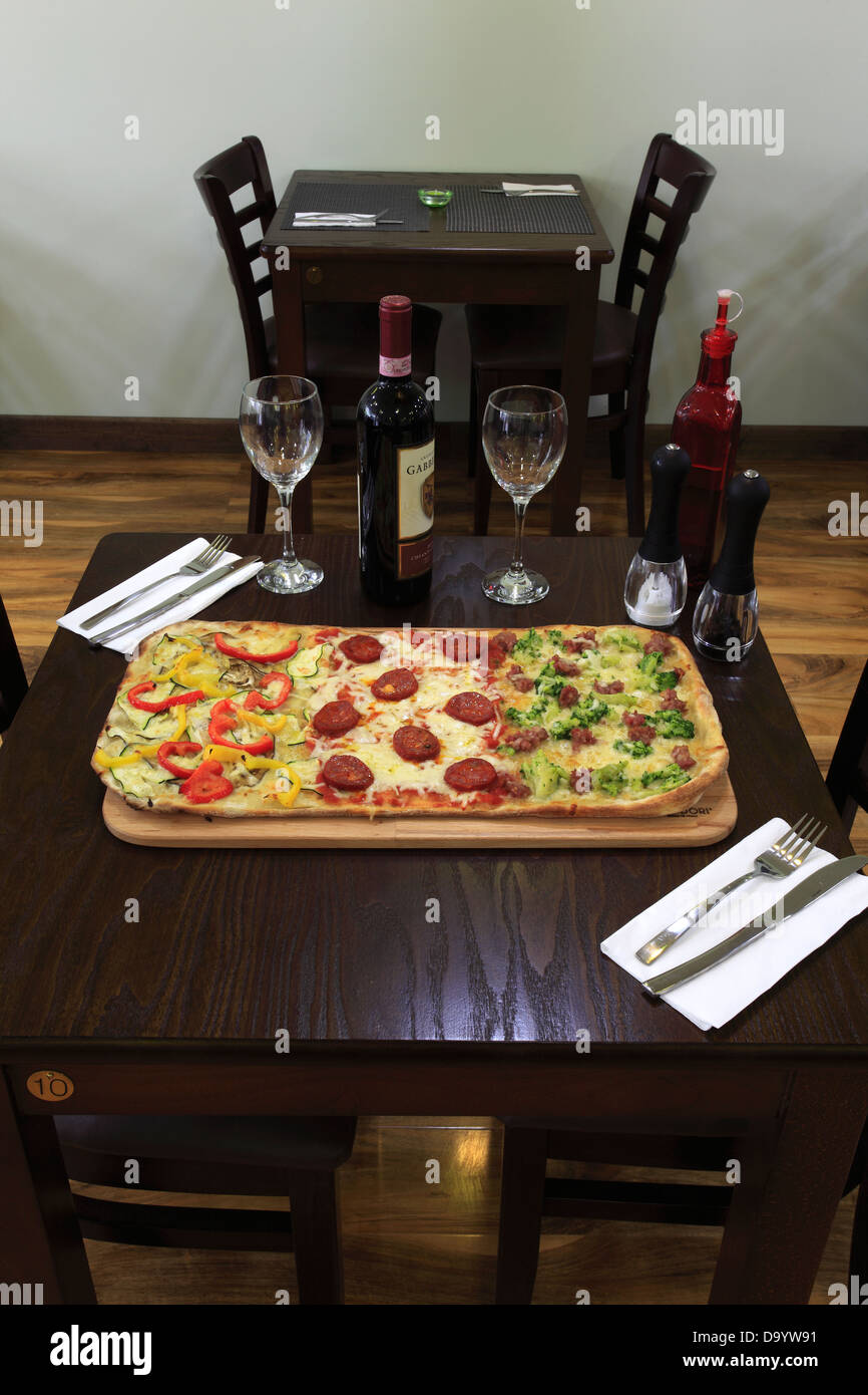 Freshly made Pizza inside a Pizza Restaurant Stock Photo - Alamy