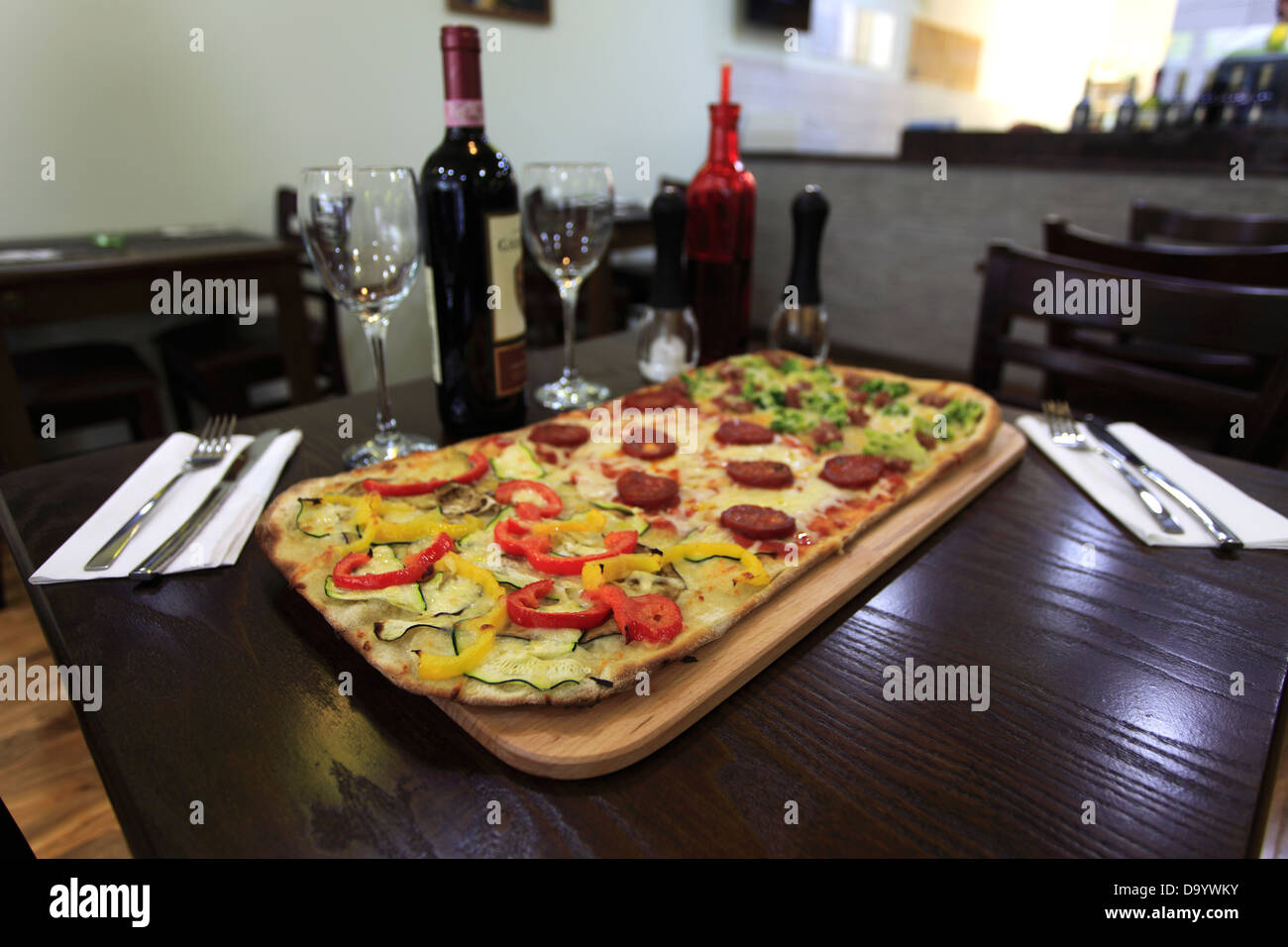 Freshly made Pizza inside a Pizza Restaurant Stock Photo - Alamy