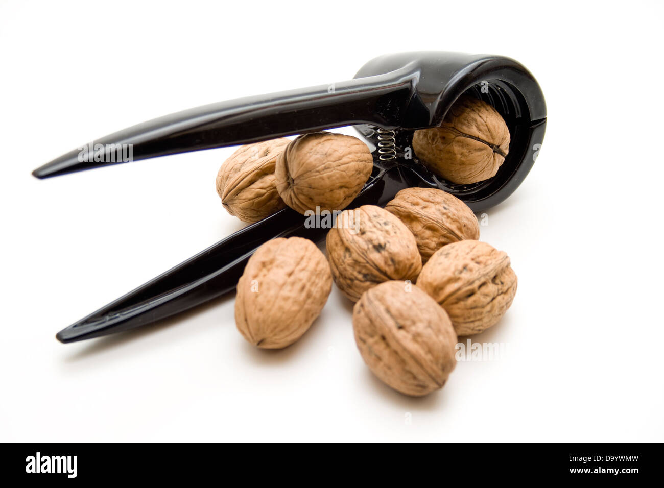 Walnuts with nutcracker Stock Photo - Alamy
