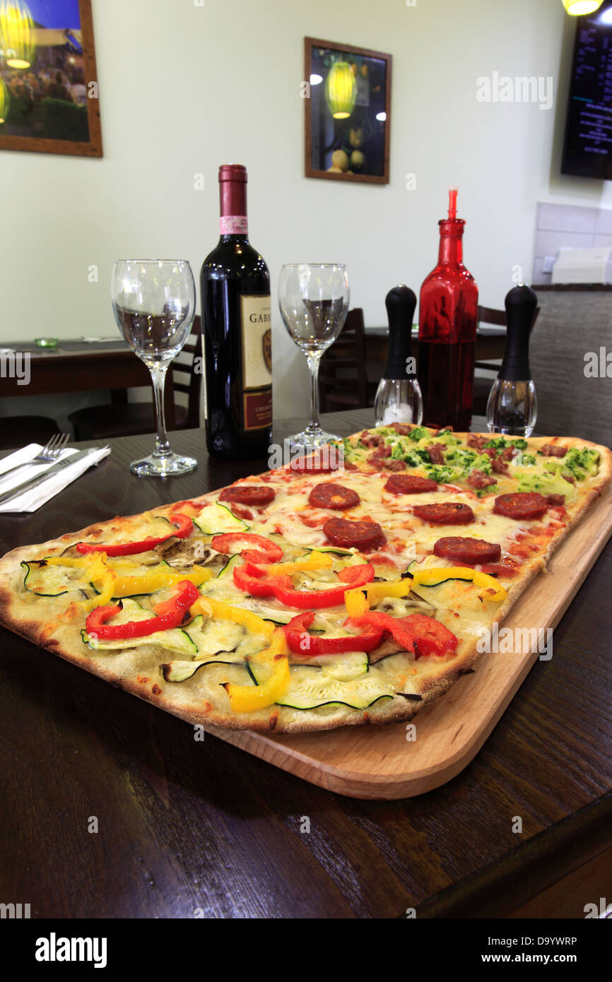 Freshly made Pizza inside a Pizza Restaurant Stock Photo - Alamy