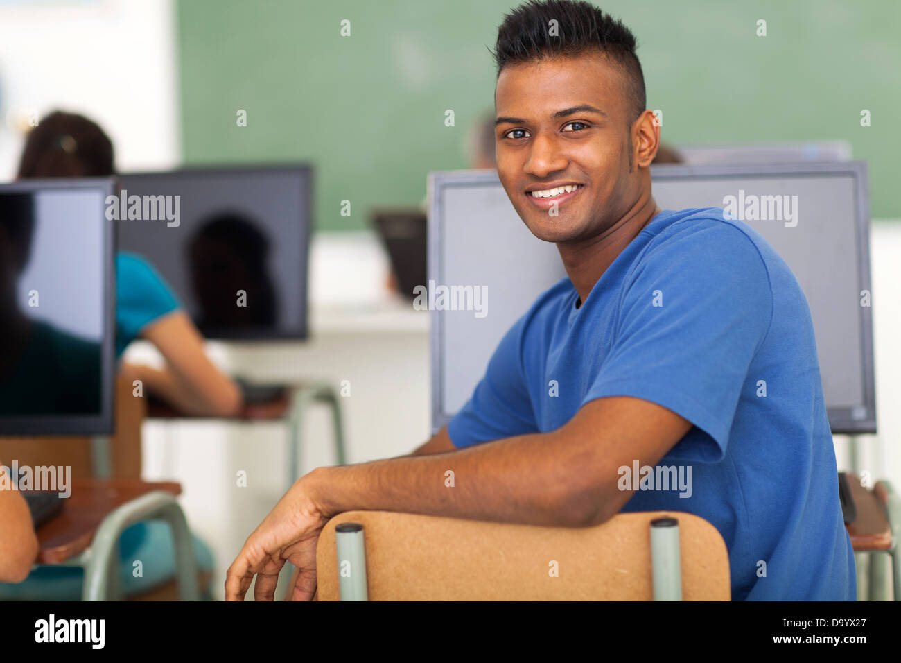 smiling male Indian high school student in classroom Stock Photo - Alamy