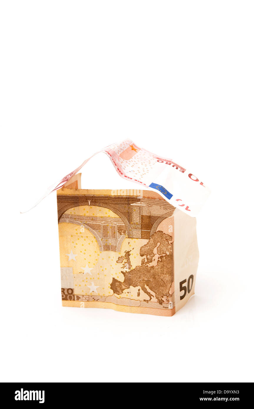 Money house on a white background Stock Photo - Alamy
