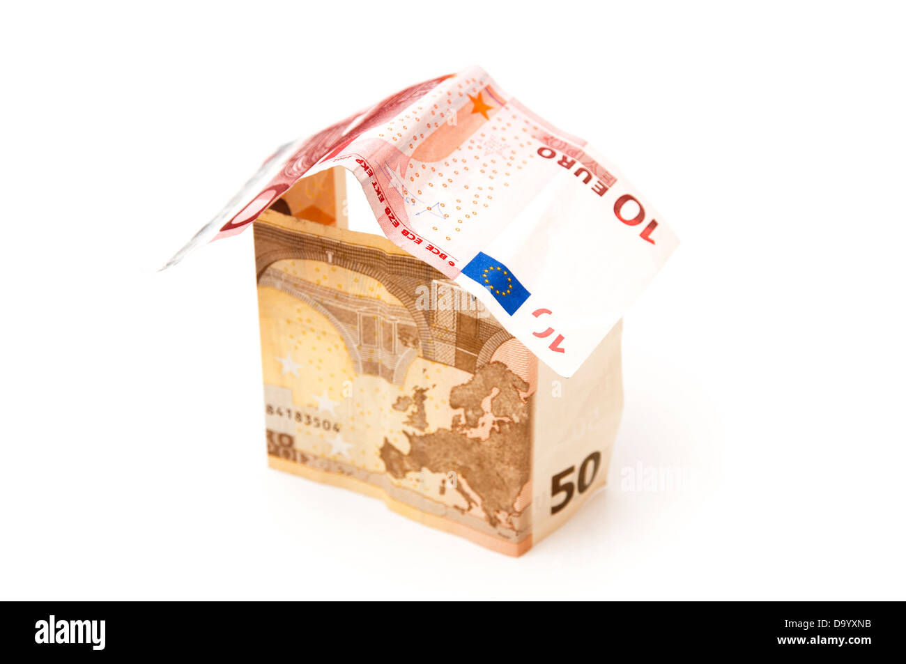 Money house on a white background Stock Photo - Alamy