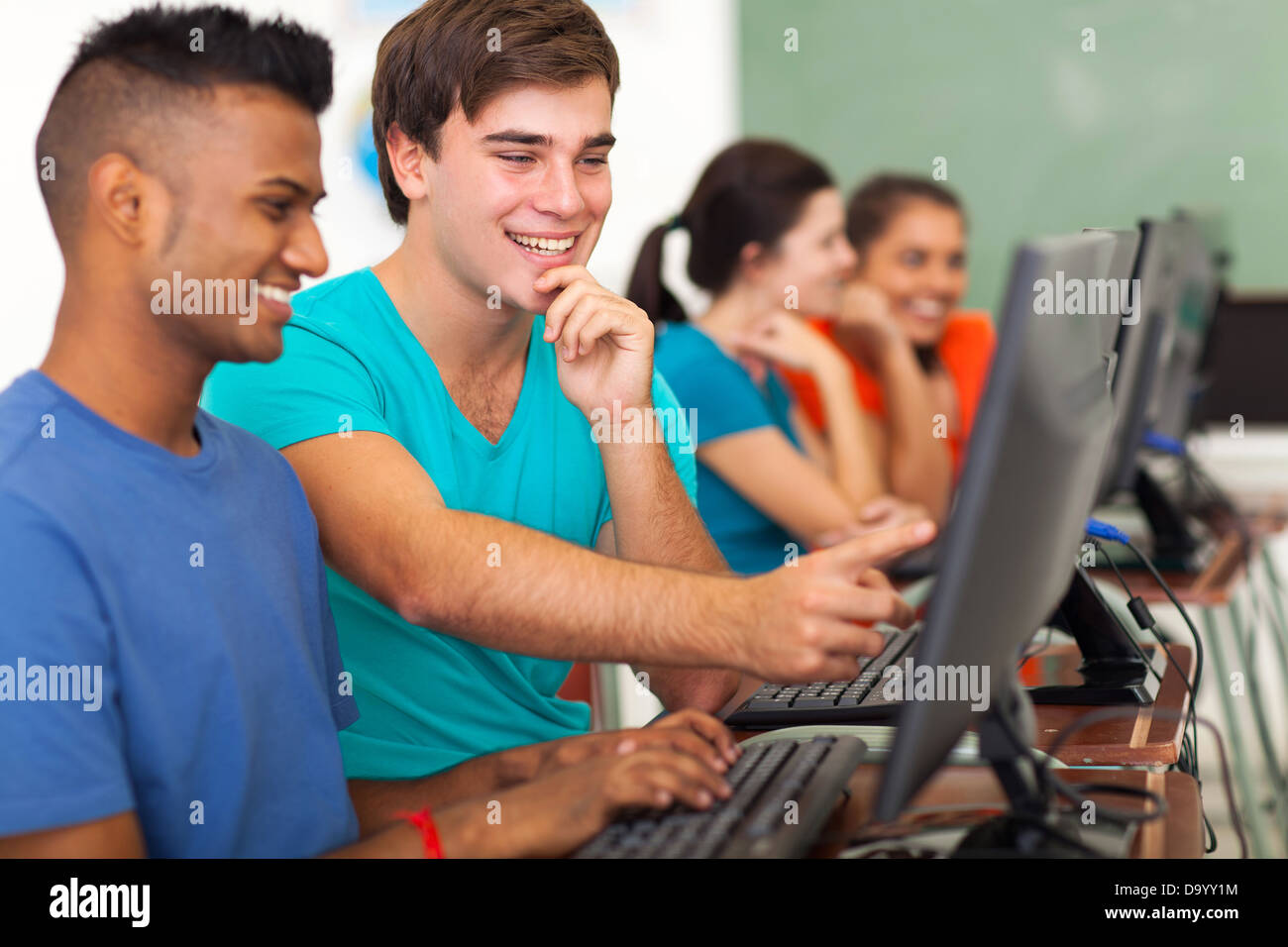Classmate helping friend hi-res stock photography and images - Alamy