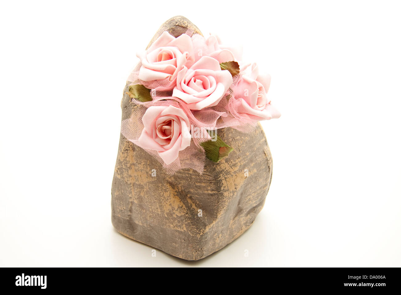 Roses in stone vase Stock Photo - Alamy