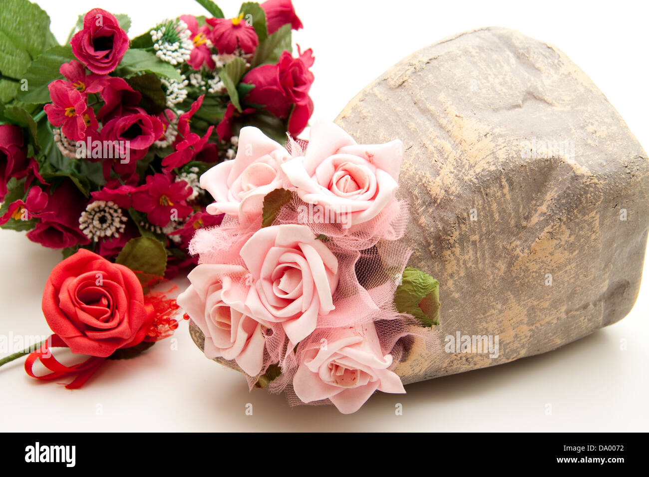 Roses in stone vase Stock Photo - Alamy