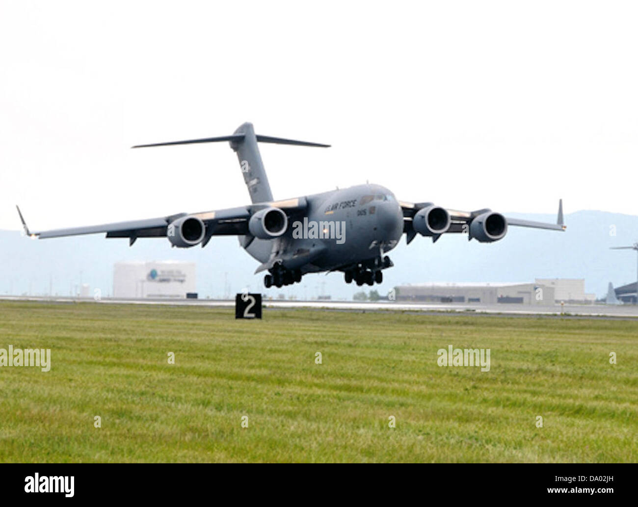 The 137th Airlift Squadron’s C-17 Globemaster III is shown arriving at ...