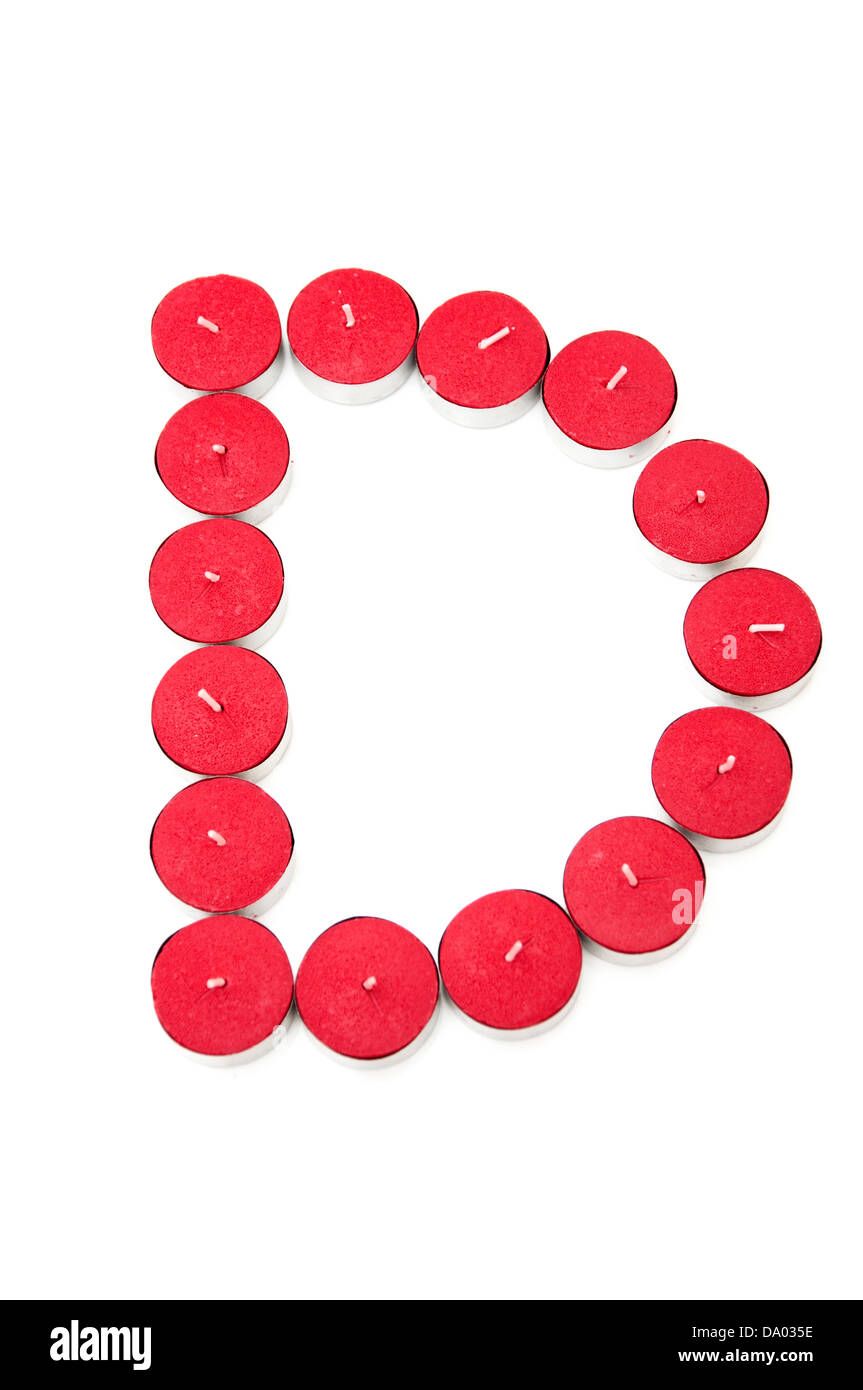 Letter D formed by candles on a white background Stock Photo - Alamy