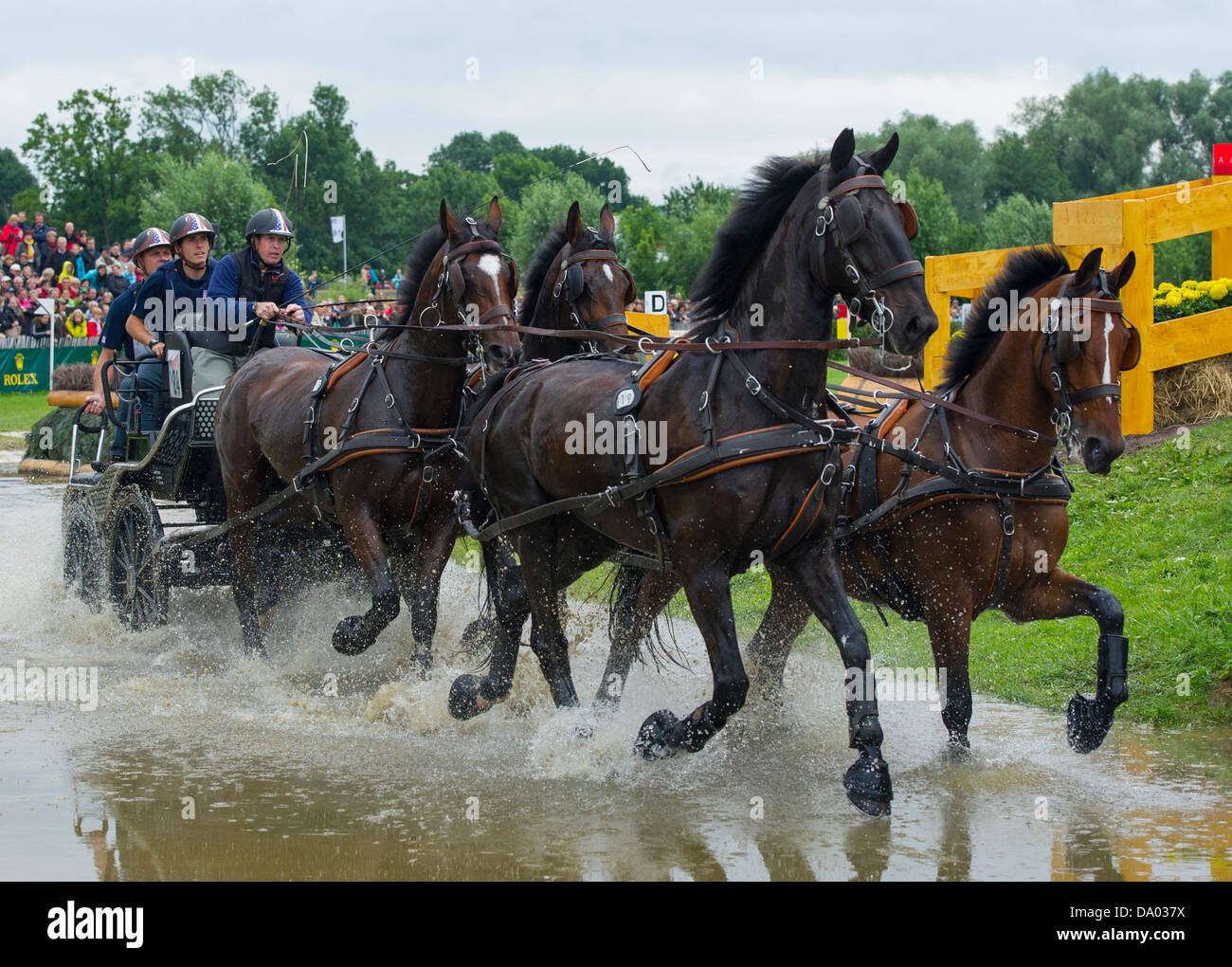 US American James Fairclough through a water hurdle during the four-in ...