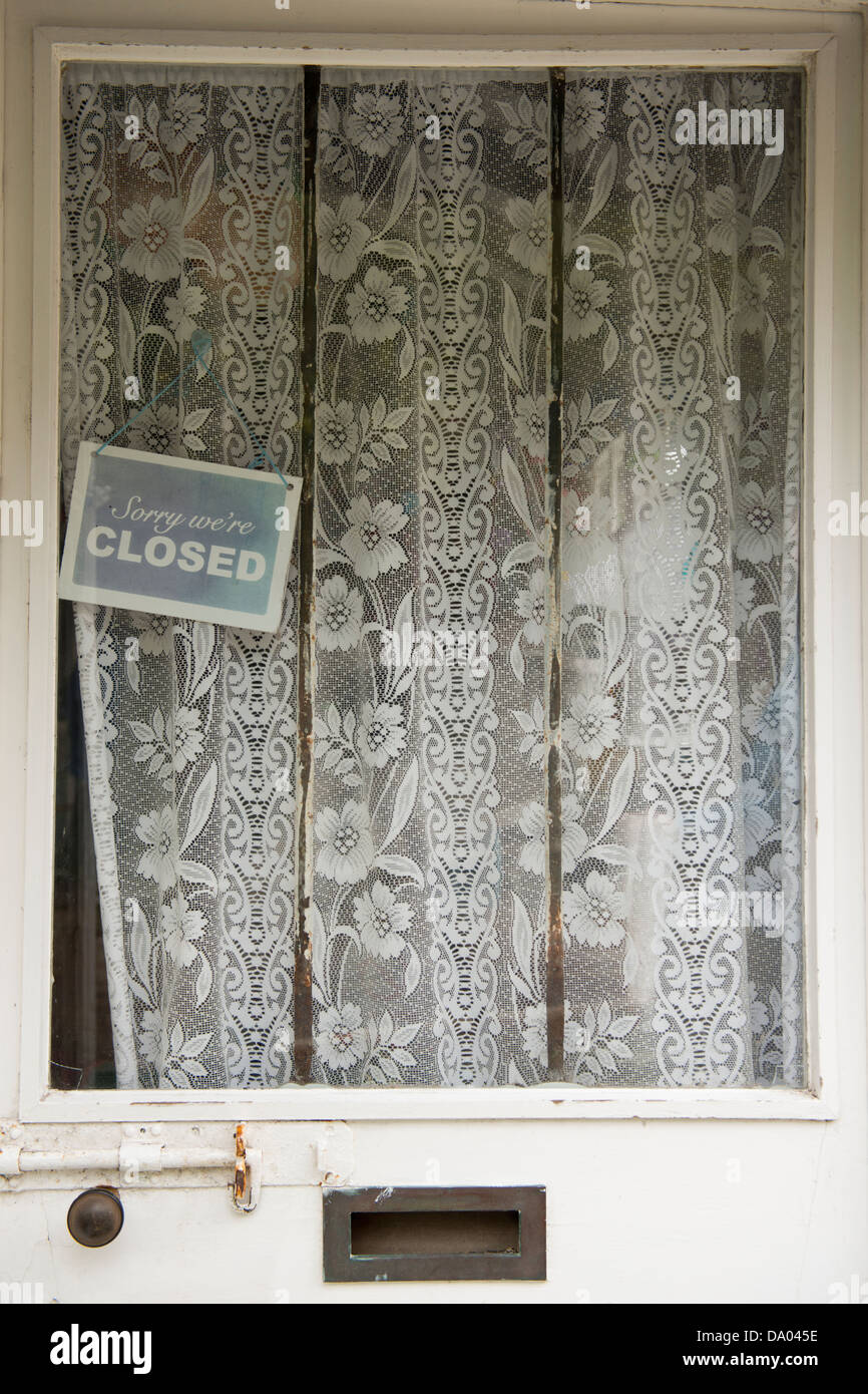 A quaint shop in Dorset, UK, with a closed sign in its window Stock ...