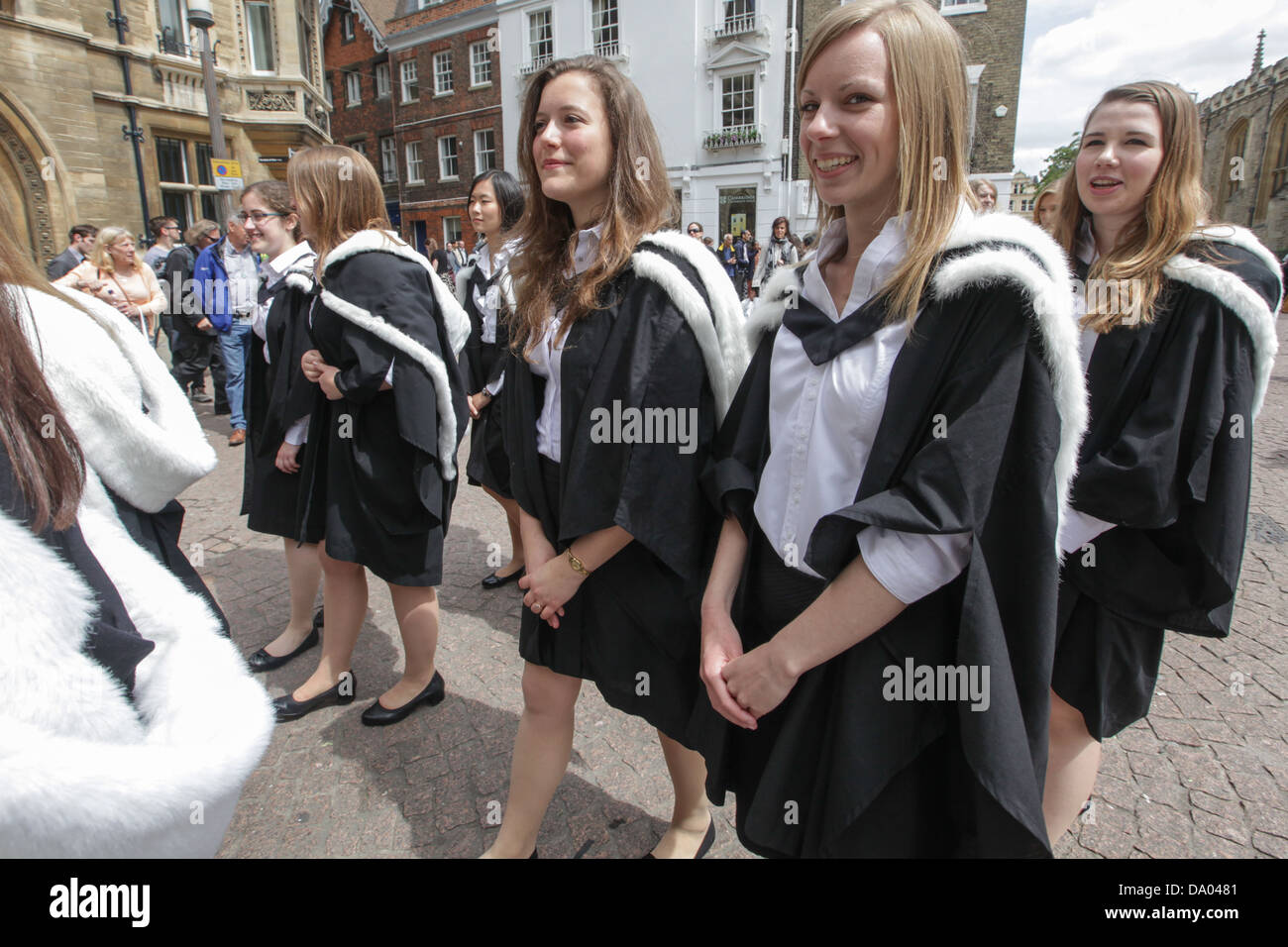 GRADUATION DAT AT CAMBRIDGE UNIVERSITY SHOWS STUDENTS ON THEIR WAY TO ...